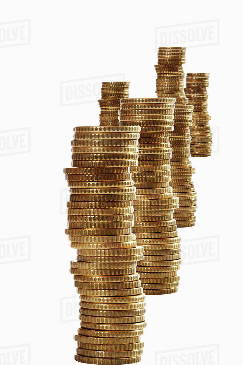Coin stacks against white background - Stock Photo - Dissolve