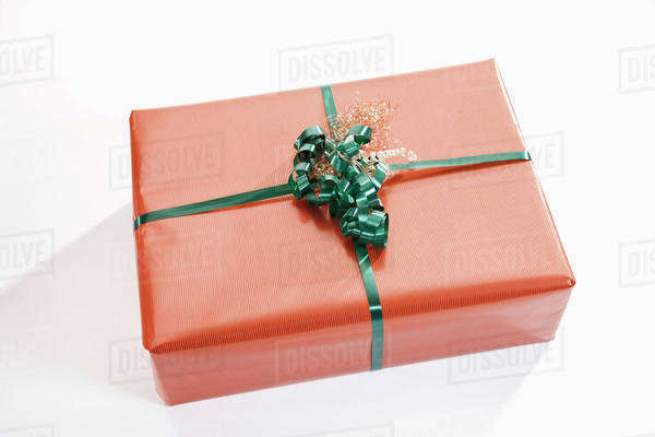 Gift parcel, elevated view - Stock Photo - Dissolve