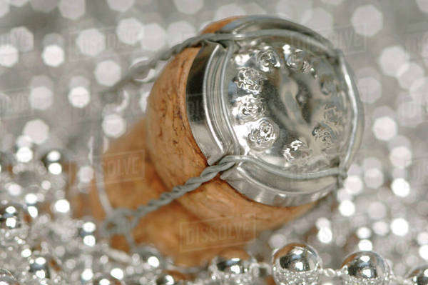 Sparkling wine cork, close-up - Stock Photo - Dissolve