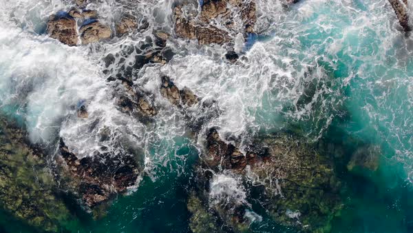 Big waves beating against rocks on a beach. - 4K Royalty-free Stock ...
