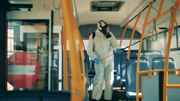 Chemical treatment carried out by the sanitation expert in the bus ...