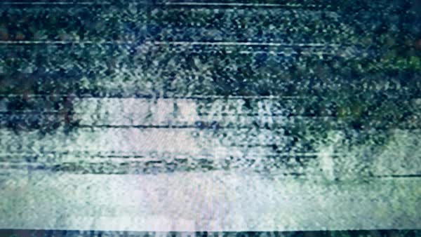 Pixelized video display is flickering. Real glitch, noise on a tv ...