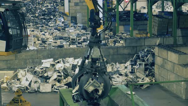 Dredger's claw moving with garbage inside of it - 4K Royalty-free Stock ...