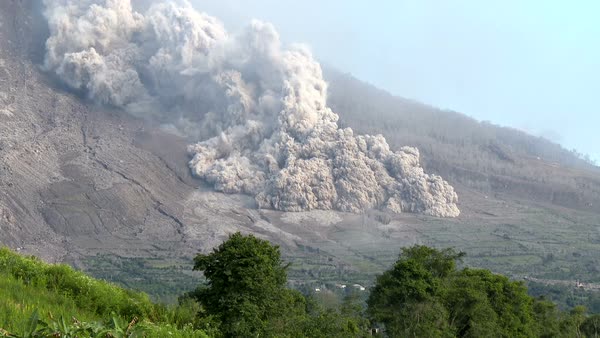 Deadly pyroclastic flow sweeps down volcano during eruption - Stock ...