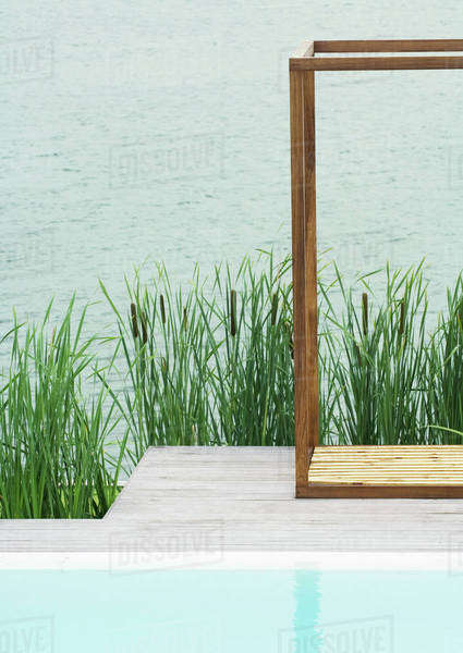Wooden structure on deck by edge of water - Royalty-free Stock Photo ...