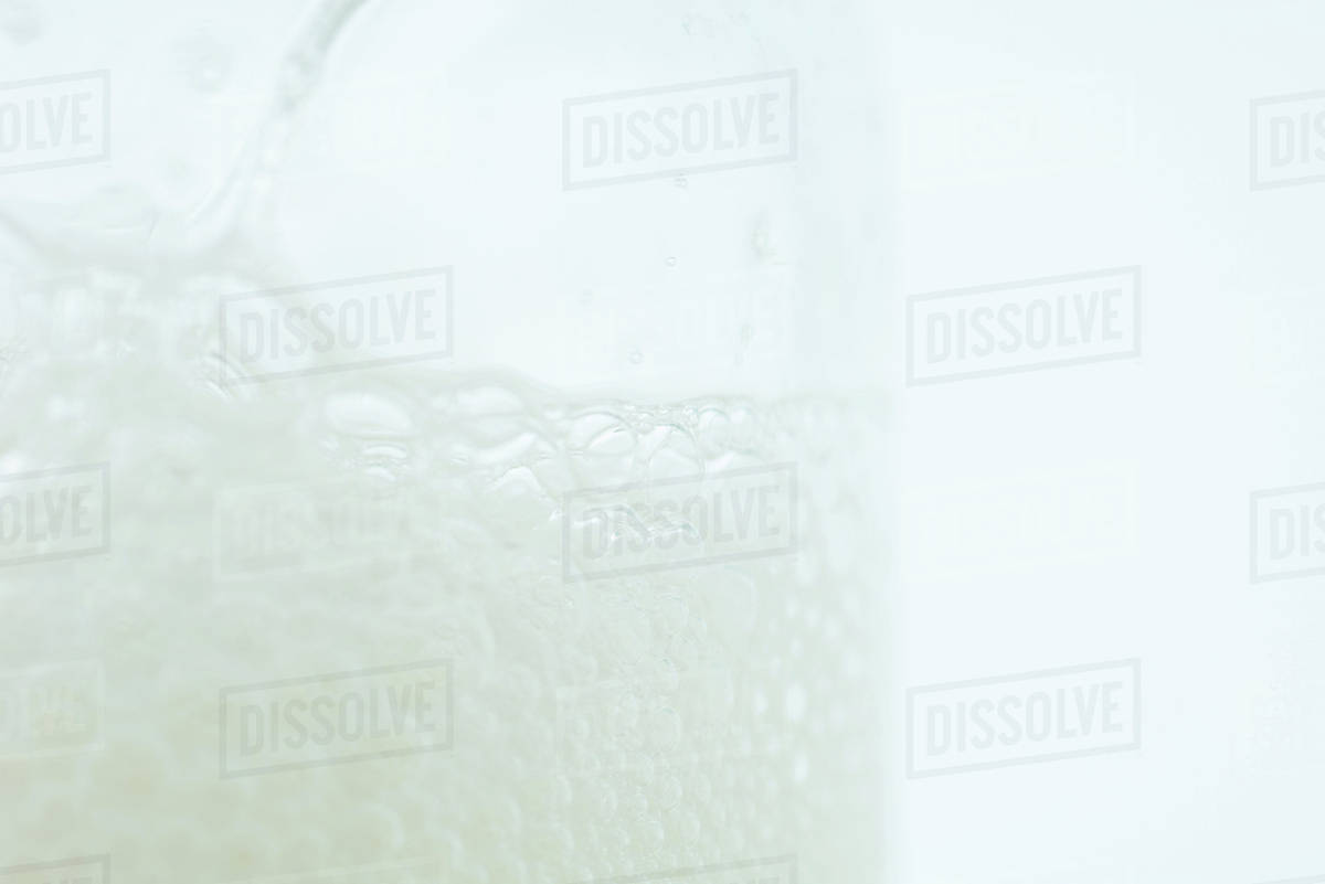Bubbles in glass, extreme close-up - Royalty-free Stock Photo | Dissolve