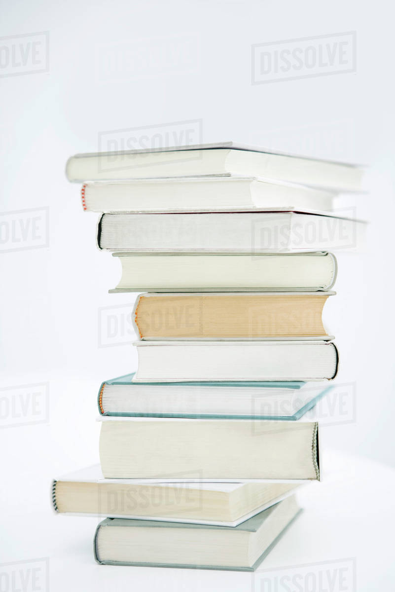 Tall stack of books - Stock Photo - Dissolve