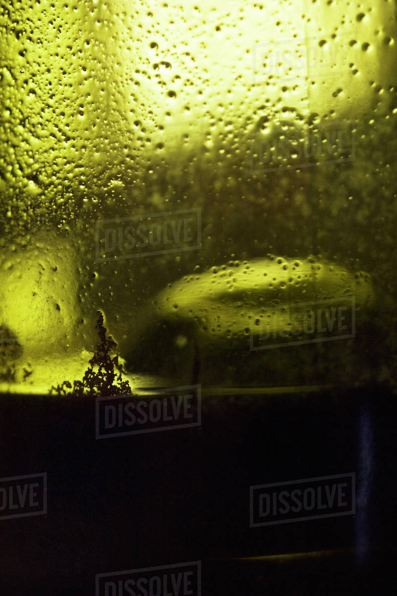 Wine sediment streaking side of wine bottle, extreme close-up - Royalty ...
