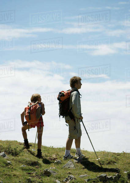 Hikers taking break - Royalty-free Stock Photo | Dissolve