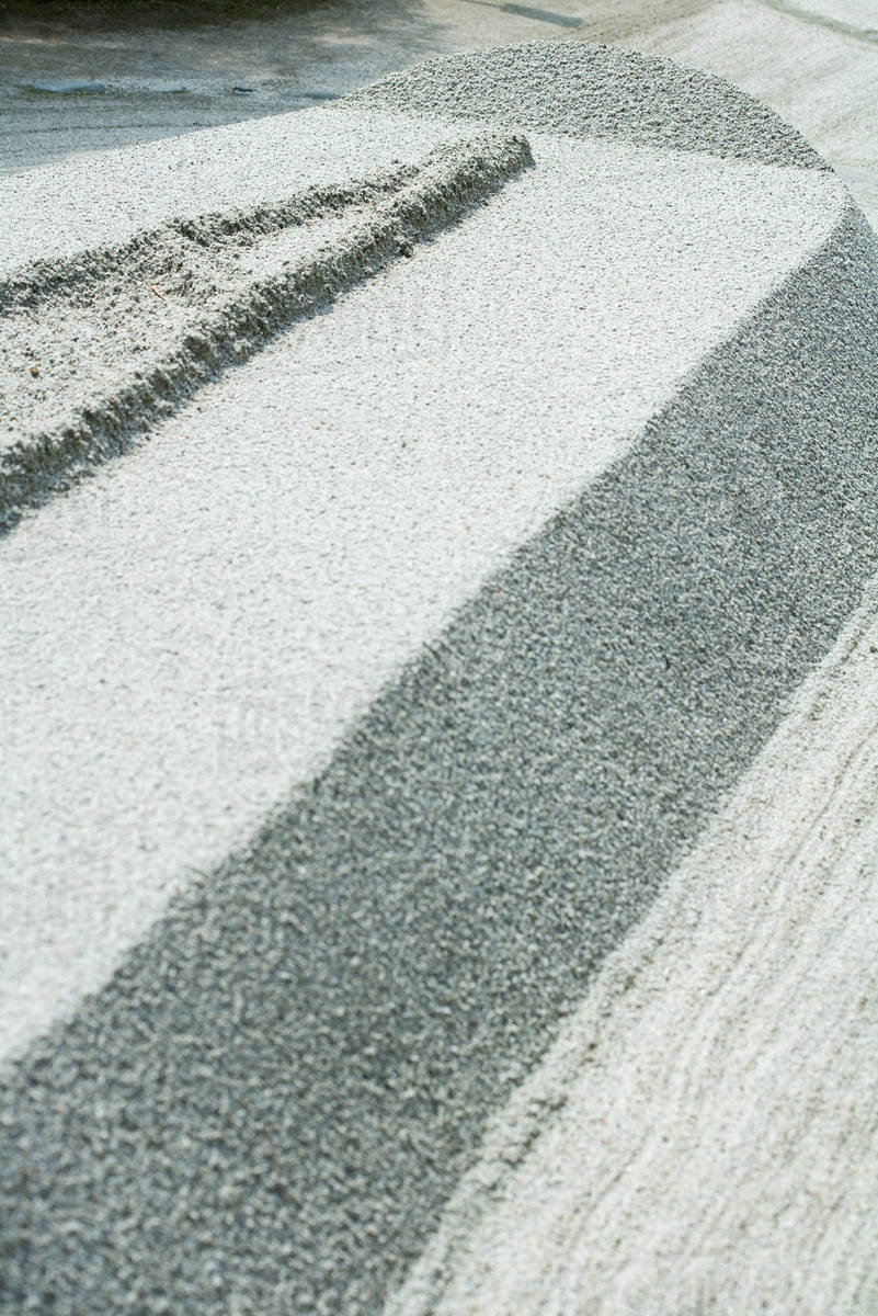 Patterns raked in gravel, close-up - Royalty-free Stock Photo | Dissolve