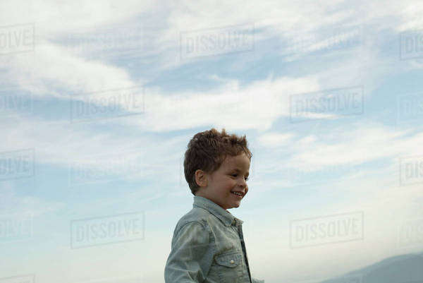 LIttle boy outside, portrait - Royalty-free Stock Photo | Dissolve