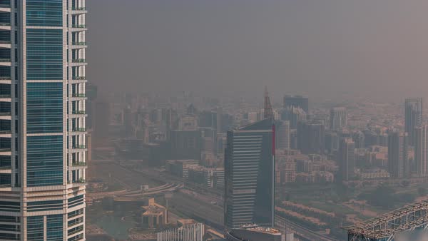 Dubai Aerial view showing haze over al barsha heights and greens ...