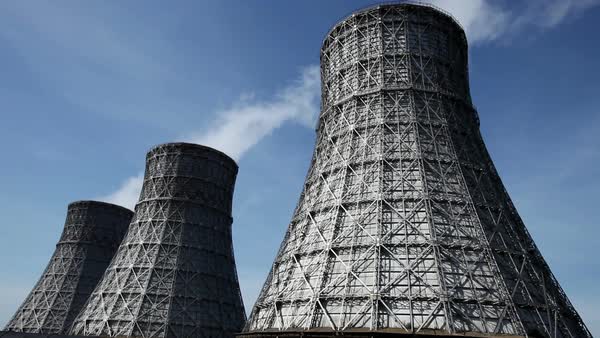 The cooling system of a nuclear reactor. Three cooling towers - Stock ...