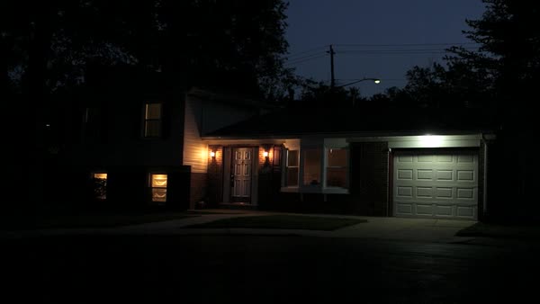 Tilt-down shot of a suburban house at night - HD Rights-managed Stock ...