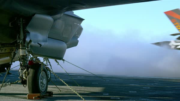 Tracking shot of a military submarine breaching surface - Stock Video ...