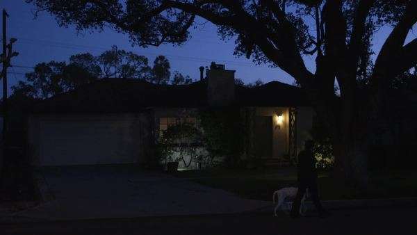 Static shot of a suburban house at night - Stock Video Footage - Dissolve