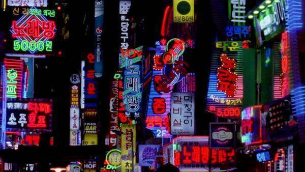 Static shot of neon signs at night on a street in Seoul - Stock Video ...