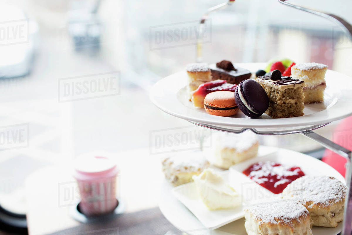 Table set for afternoon tea in café - Stock Photo - Dissolve