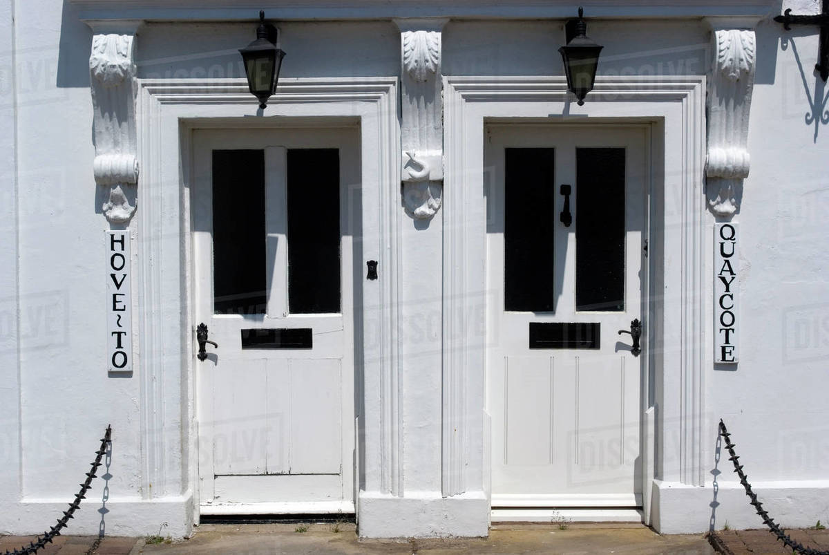 Twin white doors, Burnham-on-Crouch, Essex, England, UK. - Stock Photo ...