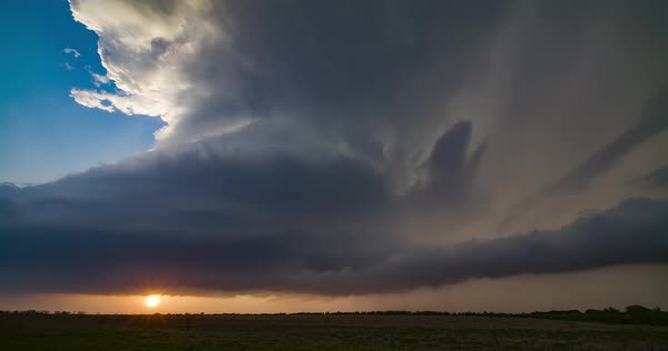 Beautiful, twisted supercell thunderstorm spins toward camera as sun ...