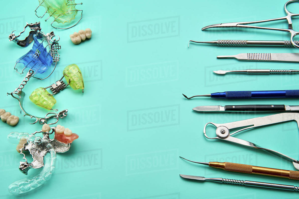 Dental Prosthetic Instruments on a Green-toned Workstation - Royalty ...