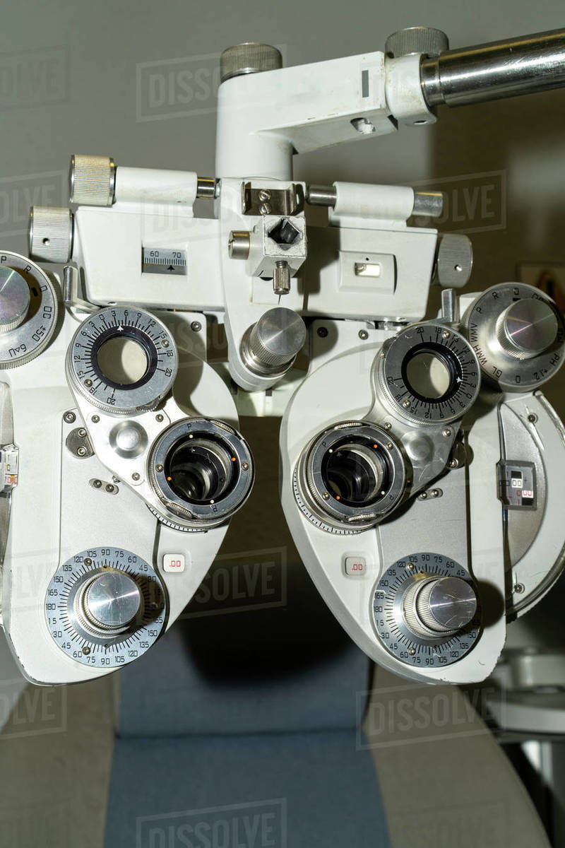 A close-up of a phoropter used by optometrists for refraction during ...