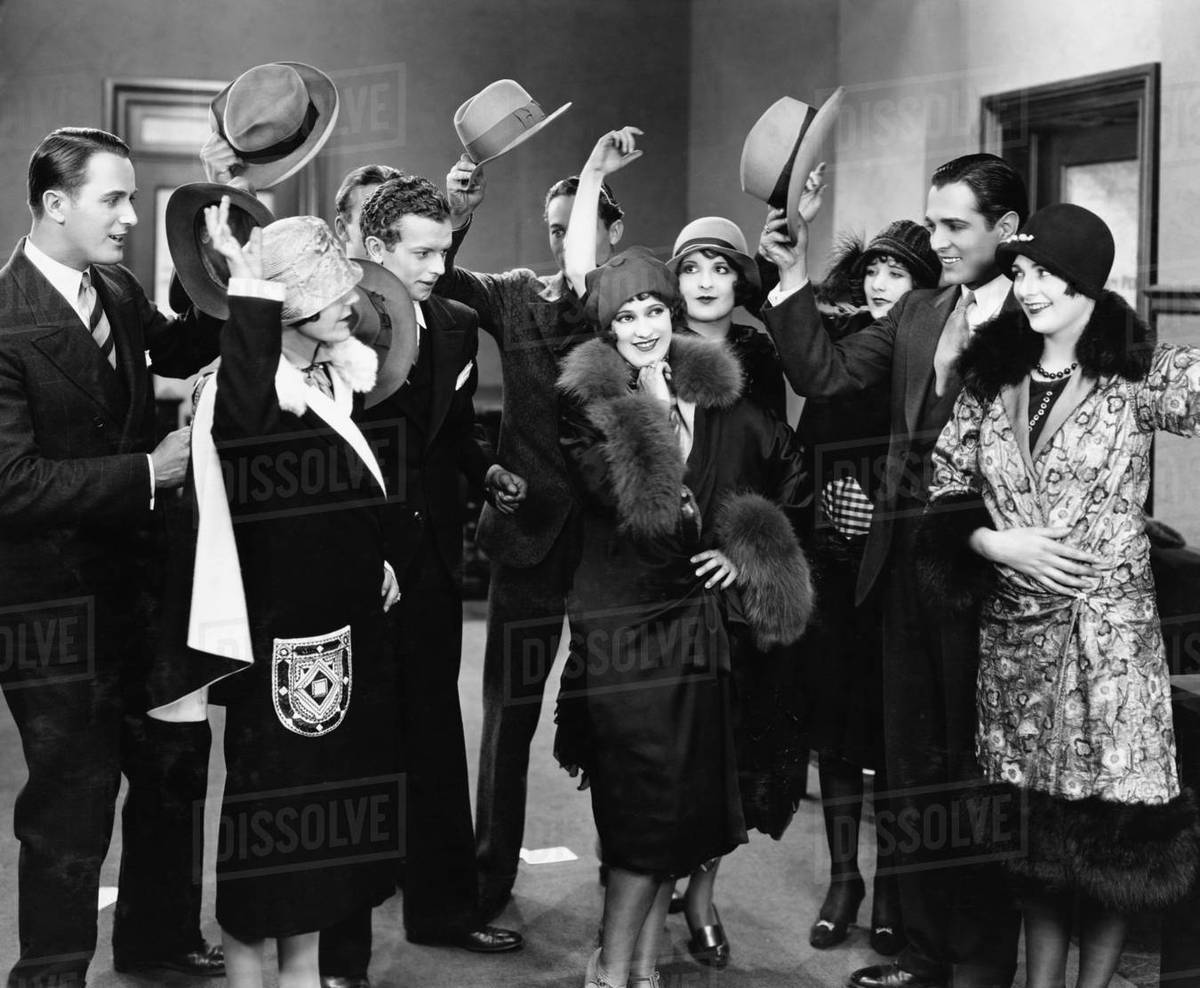Group of people taking hats off to woman - Royalty-free Stock Photo ...