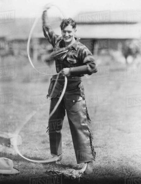 Cowboy spinning lasso - Royalty-free Stock Photo | Dissolve