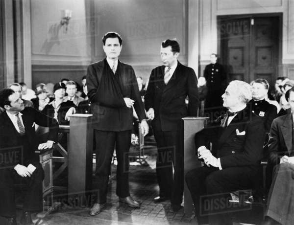 Handcuffed injured man in crowded courtroom - Royalty-free Stock Photo ...