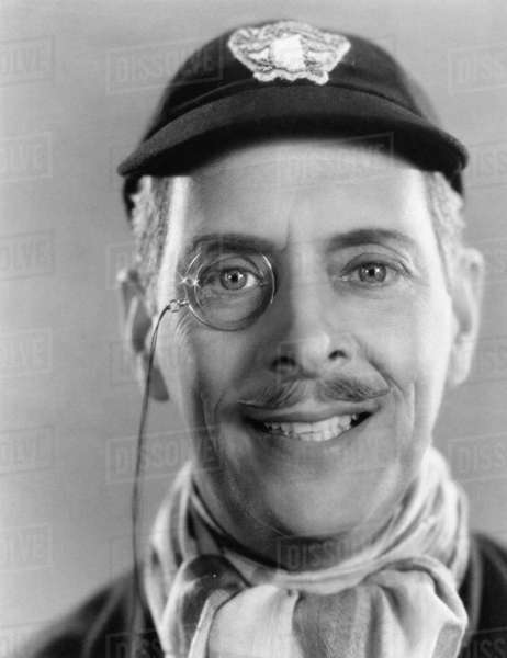 Man laughing and a monocle and a cap in his head - Royalty-free Stock ...