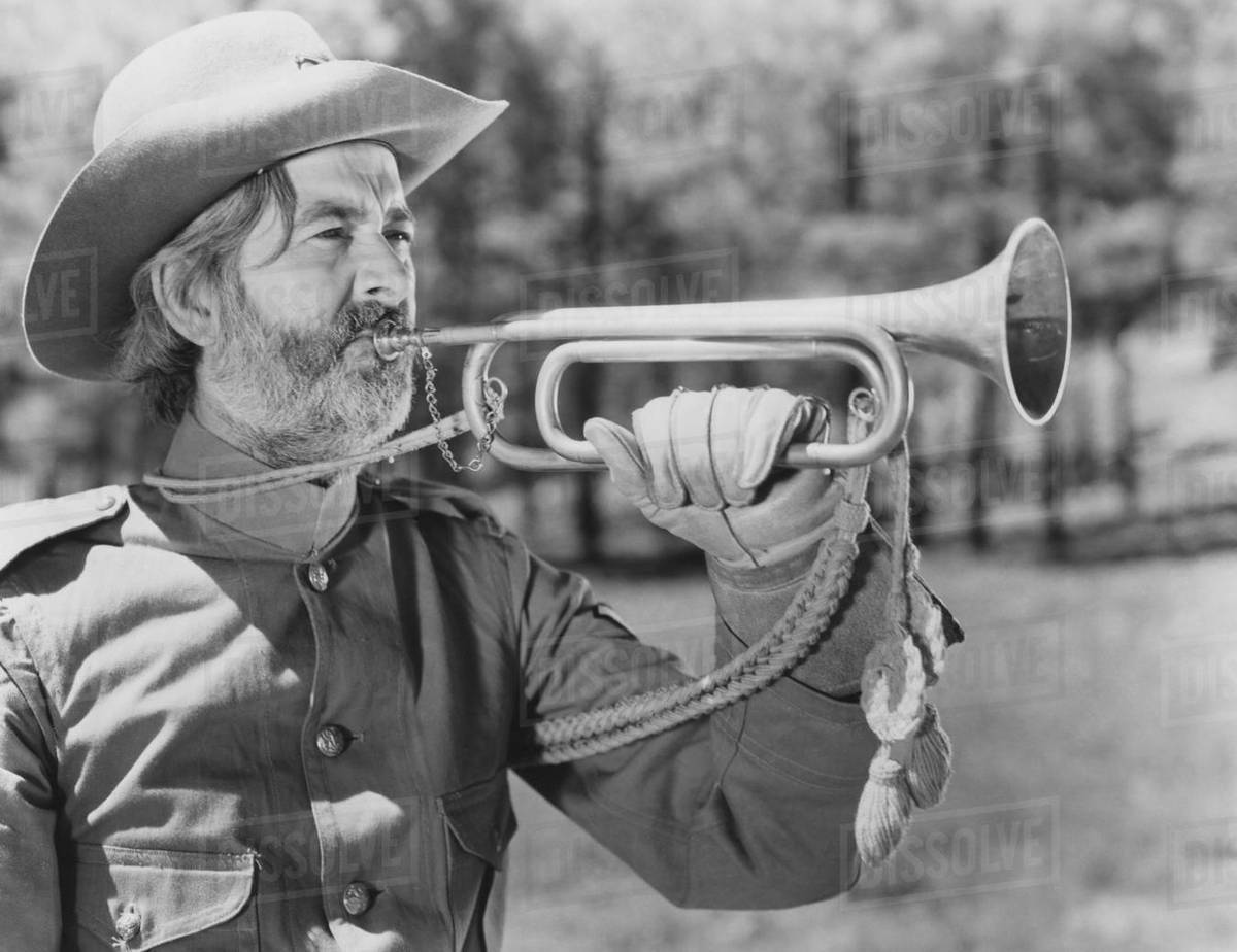 Blowing reveille - Stock Photo - Dissolve