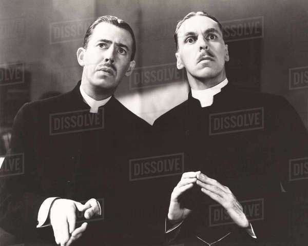 Two solemn priests - Stock Photo - Dissolve