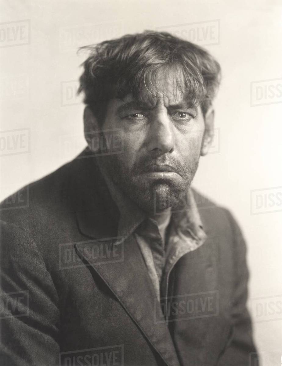 Despondent man - Stock Photo - Dissolve