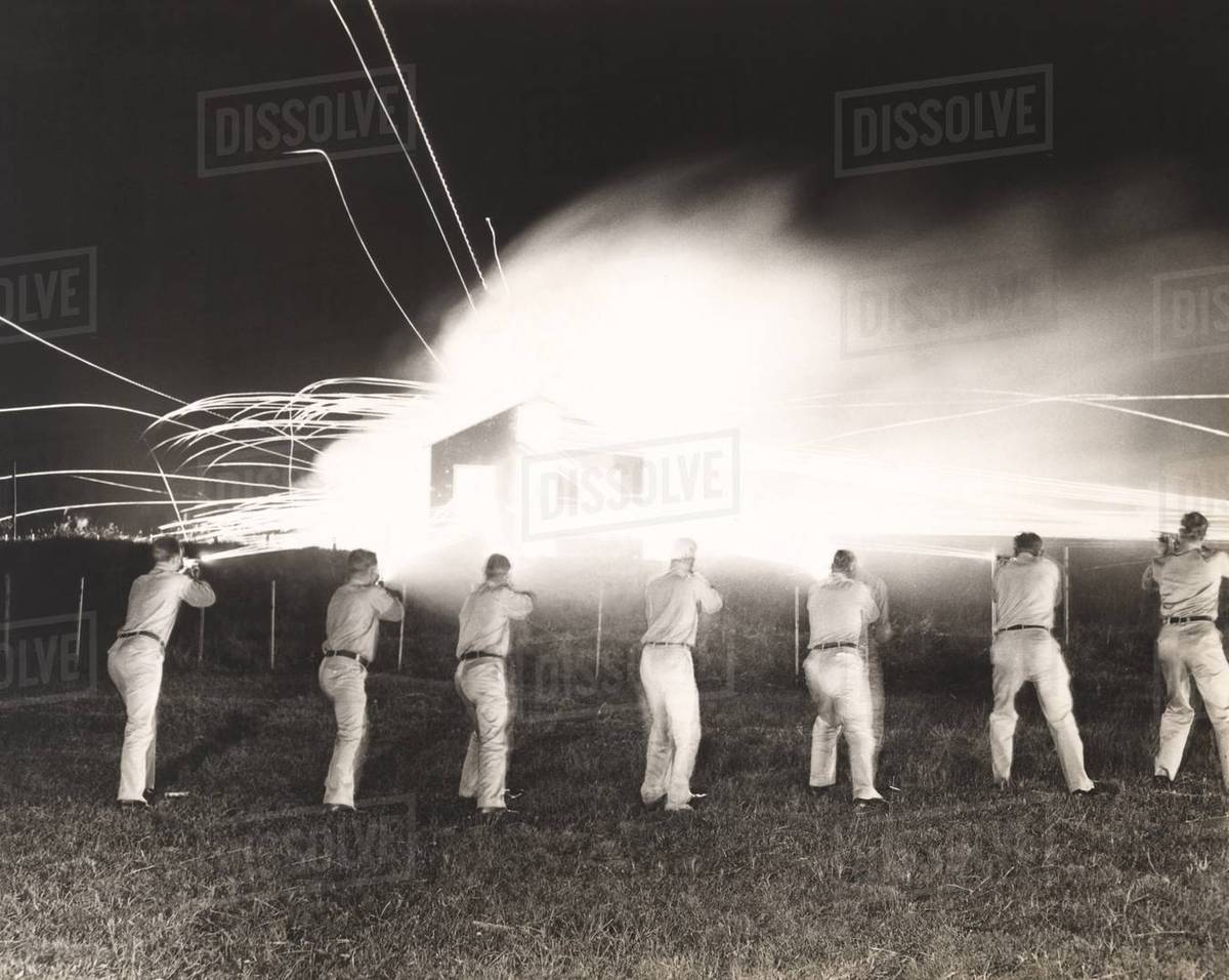 A demonstration of night sub-machine gun firing - Royalty-free Stock ...