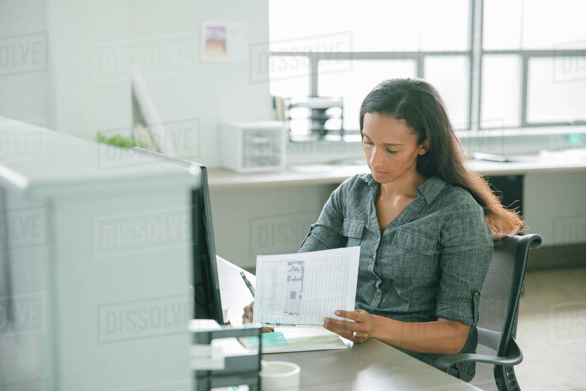 Female office worker writing into a notepad - Royalty-free Stock Photo ...
