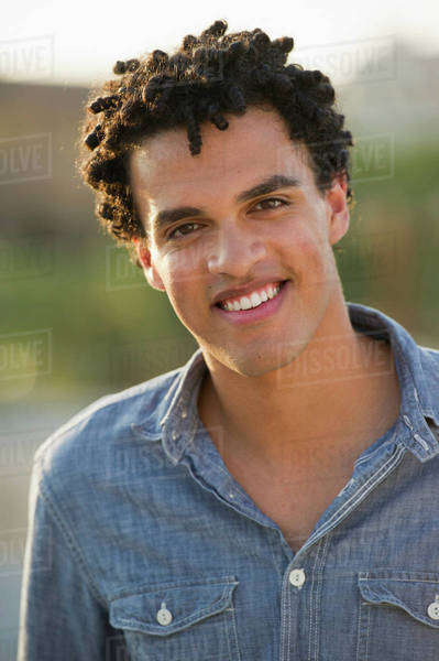 Smiling mixed race man - Stock Photo - Dissolve
