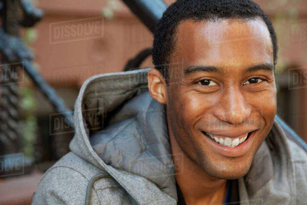Close up of smiling Black man - Royalty-free Stock Photo | Dissolve