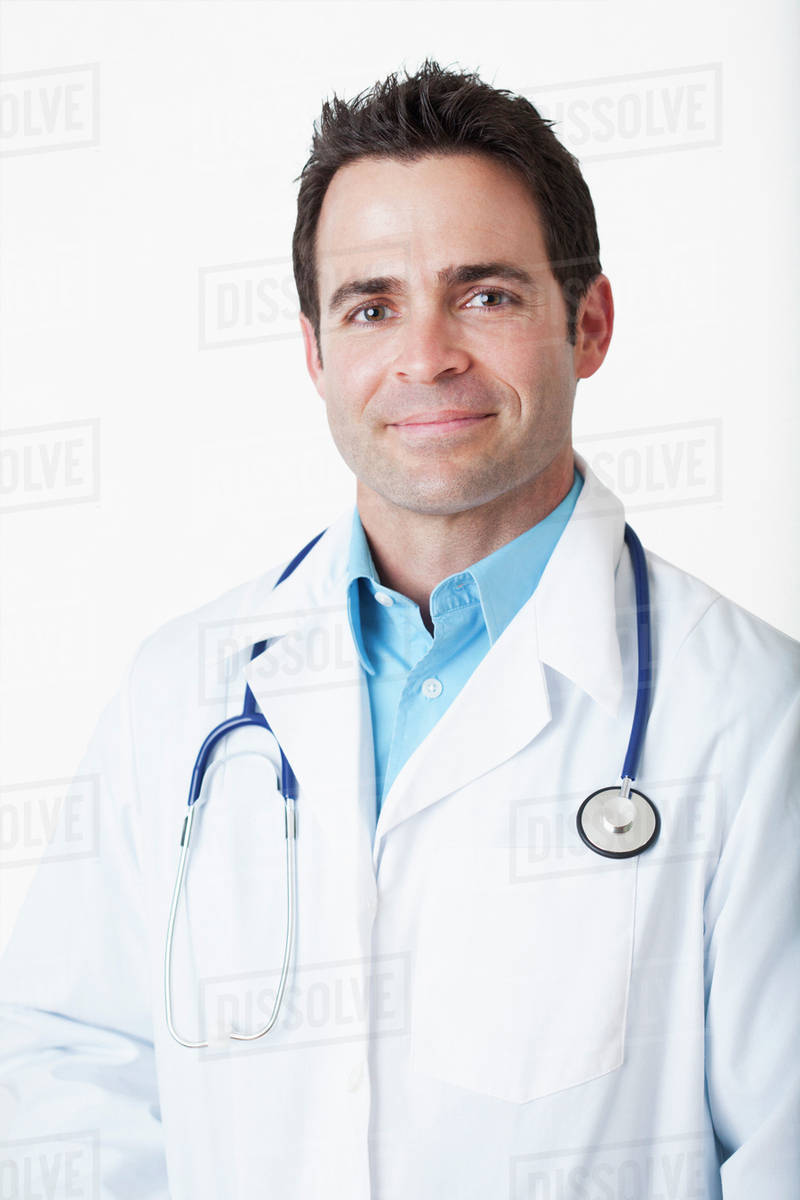 Smiling mixed race doctor - Royalty-free Stock Photo | Dissolve