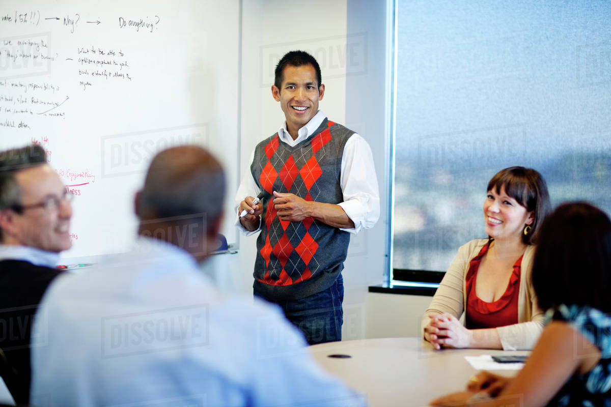 Business people having meeting in conference room - Stock Photo - Dissolve