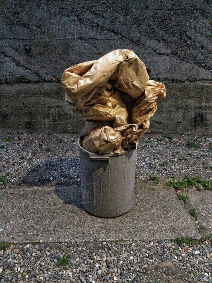 Garbage crumpled up in trash can - Royalty-free Stock Photo | Dissolve