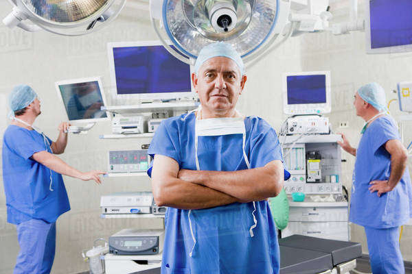 Surgeons in hospital operating room - Royalty-free Stock Photo | Dissolve