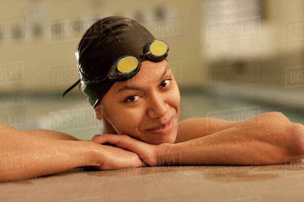 Pacific Islander swimmer in swimming pool - Stock Photo - Dissolve