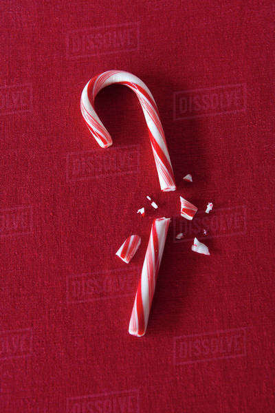 Broken candy cane - Stock Photo - Dissolve