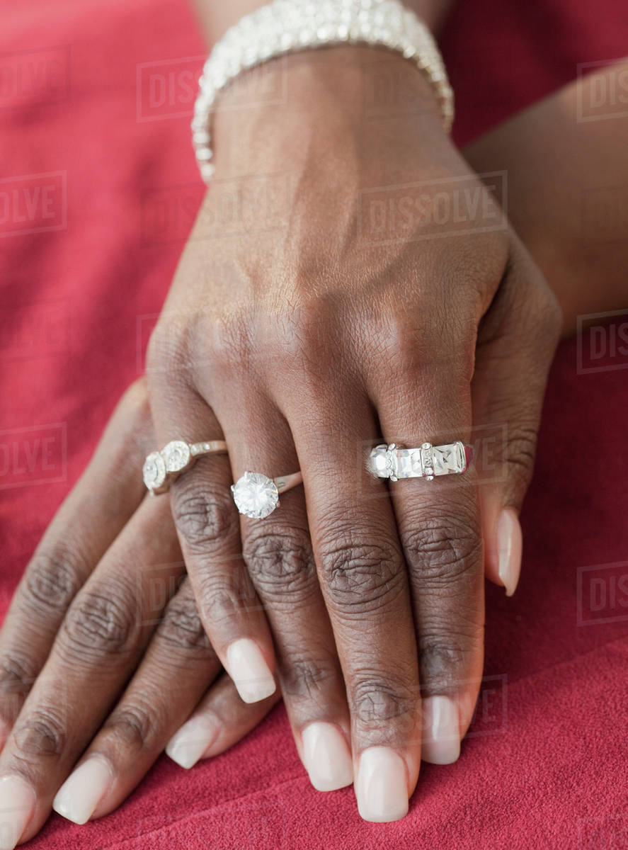 African woman wearing many diamond rings - Royalty-free Stock Photo ...