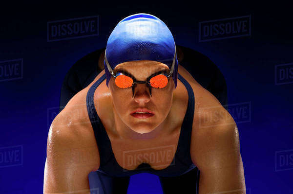 Serious swimmer in swim cap and goggles - Royalty-free Stock Photo ...