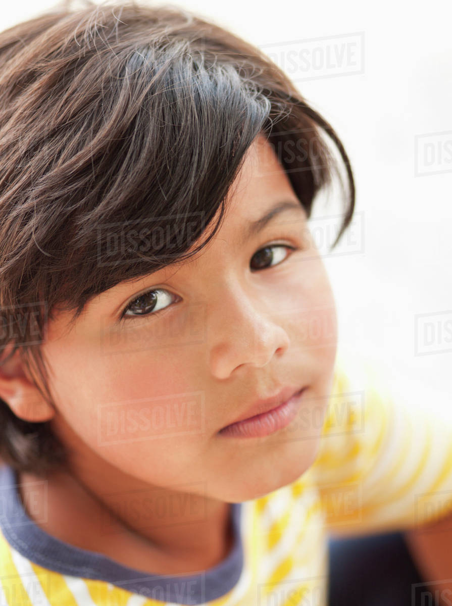 Serious Hispanic boy - Royalty-free Stock Photo | Dissolve
