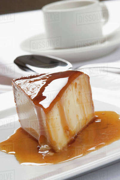 Close up of syrup over slice of dessert - Royalty-free Stock Photo ...