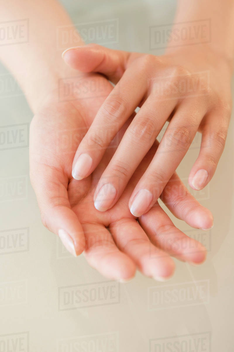 Close up of hands of Hispanic woman - Royalty-free Stock Photo | Dissolve