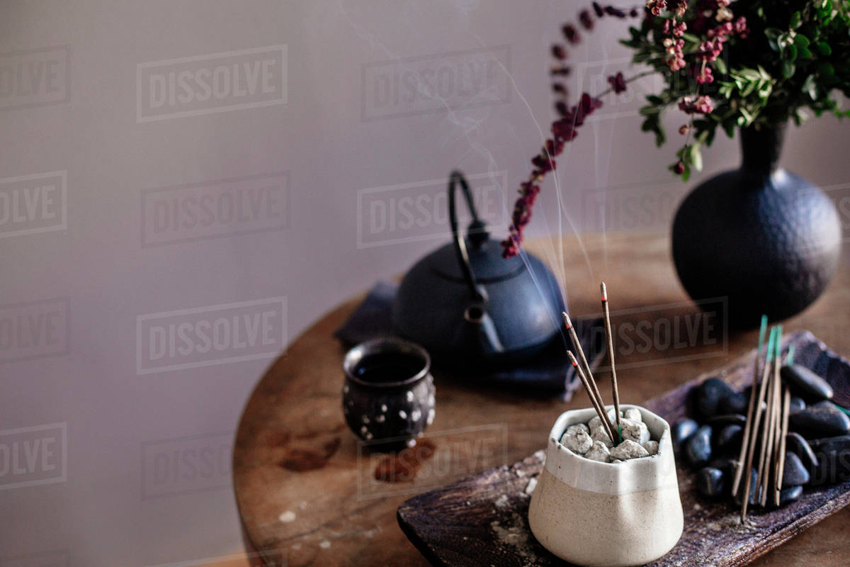 Incense burning on table - Royalty-free Stock Photo | Dissolve