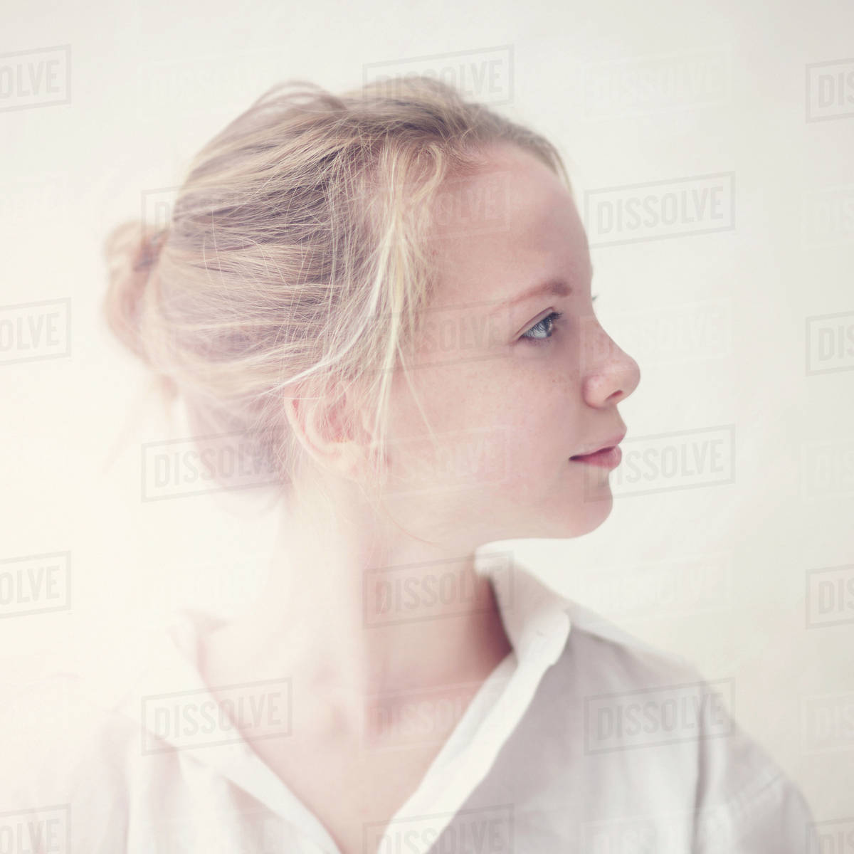 Caucasian girl looking sideways - Stock Photo - Dissolve